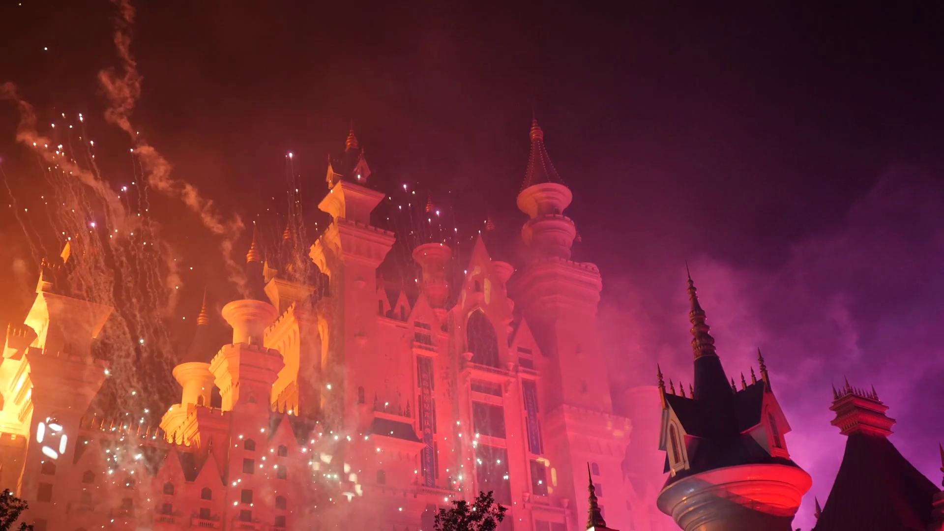 Fantasy fairytale castle with fireworks display at night. Celebration ...