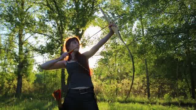 Girl Shooting Bow Stock Footage: Royalty-Free Video Clips - Storyblocks