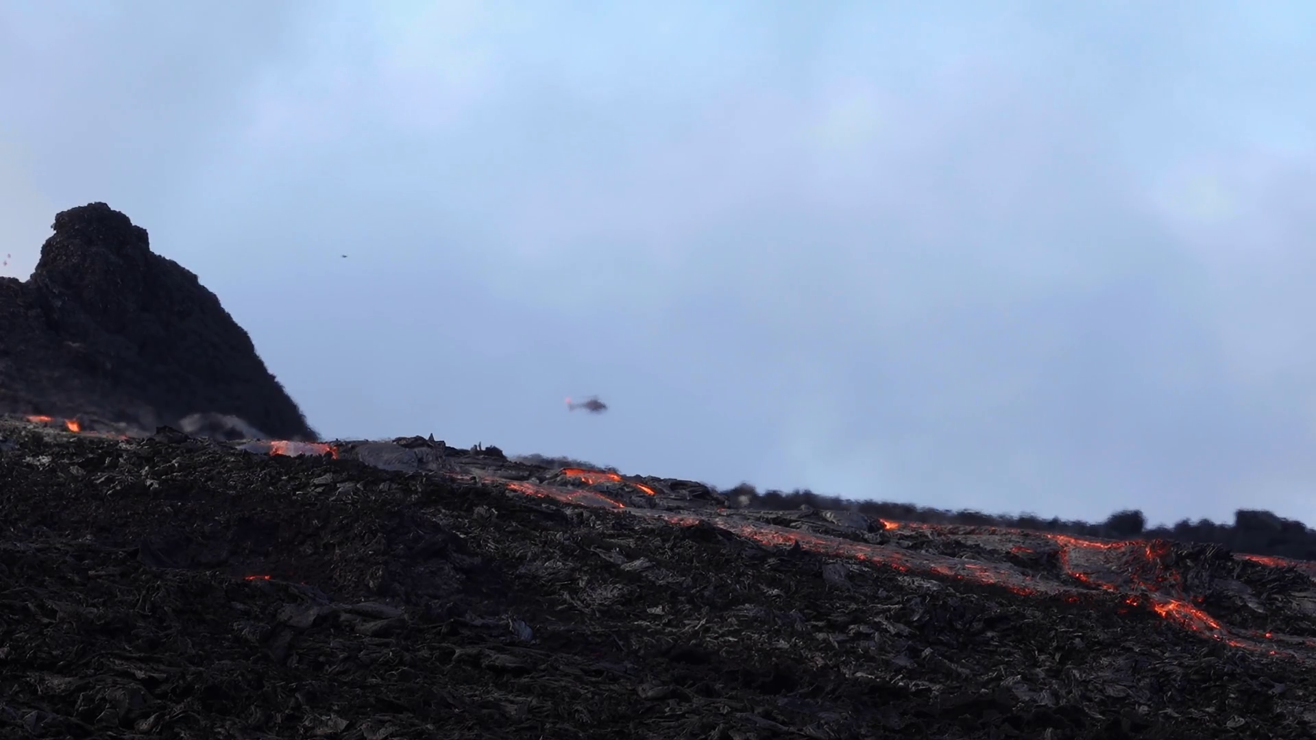 Helicopter Flying Over Erupting Volcano Lava Stock Footage SBV ...