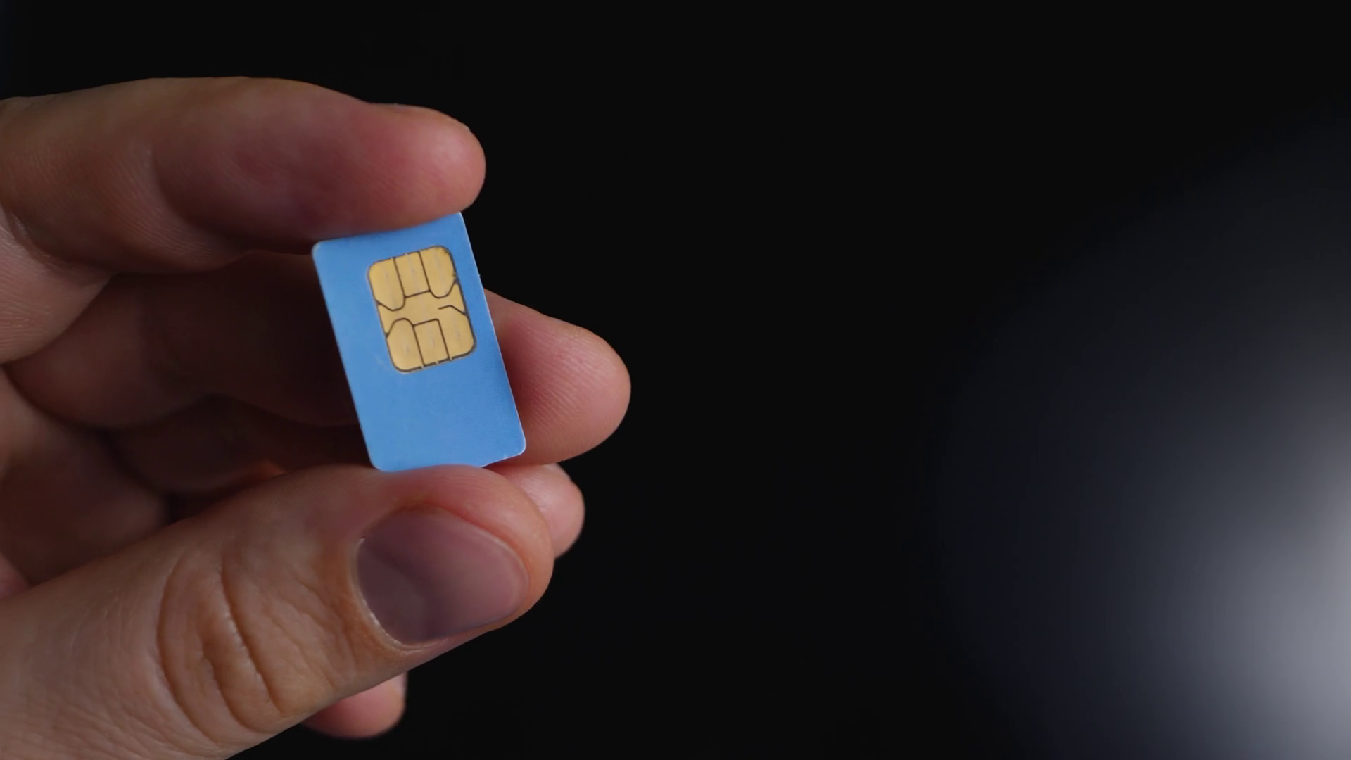 Hand Hold Blue Mini Sim Card On Black Stock Footage SBV-348511507 ...