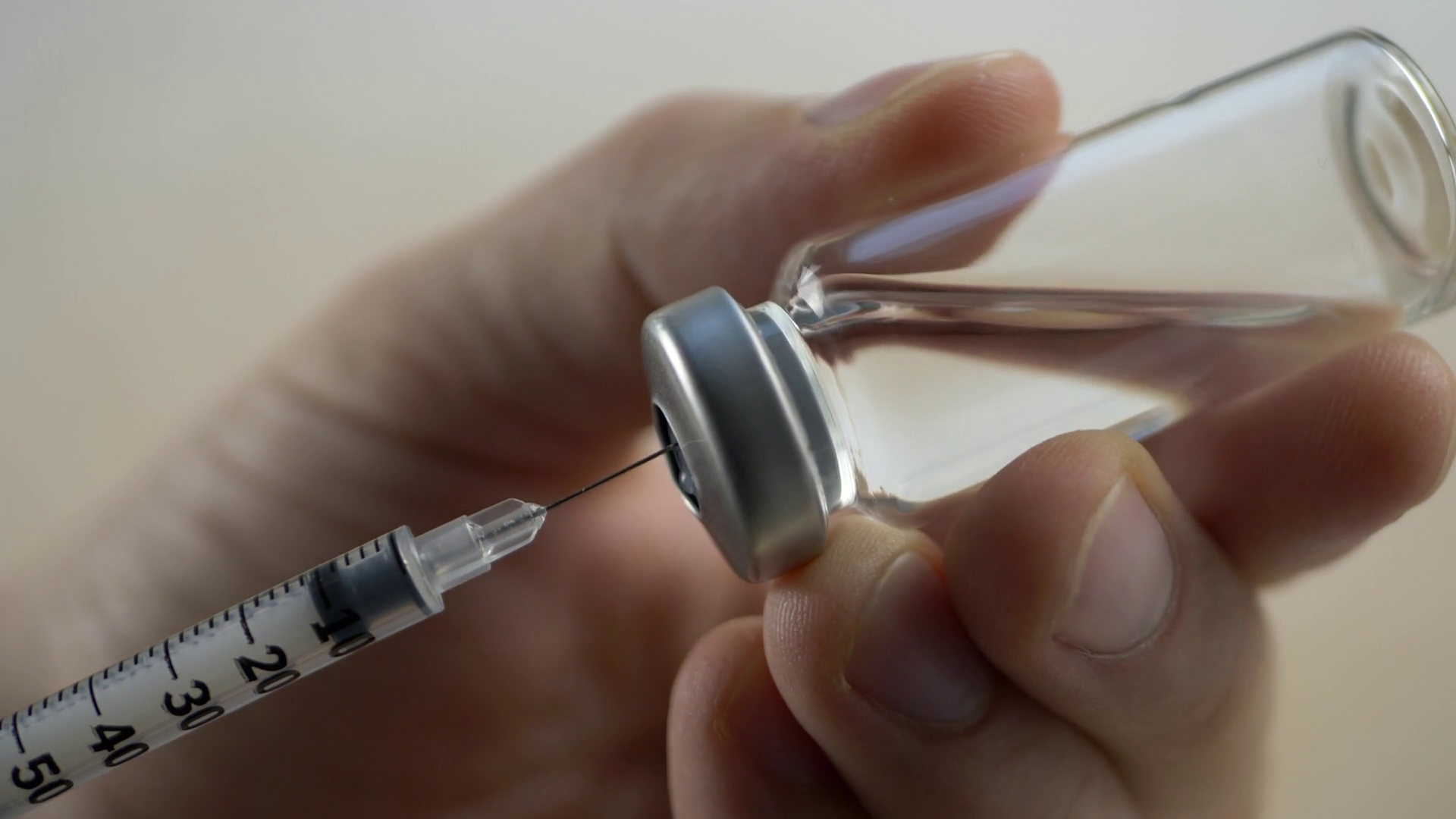 Medical hands and syringes are being vaccinated to patients in the ...