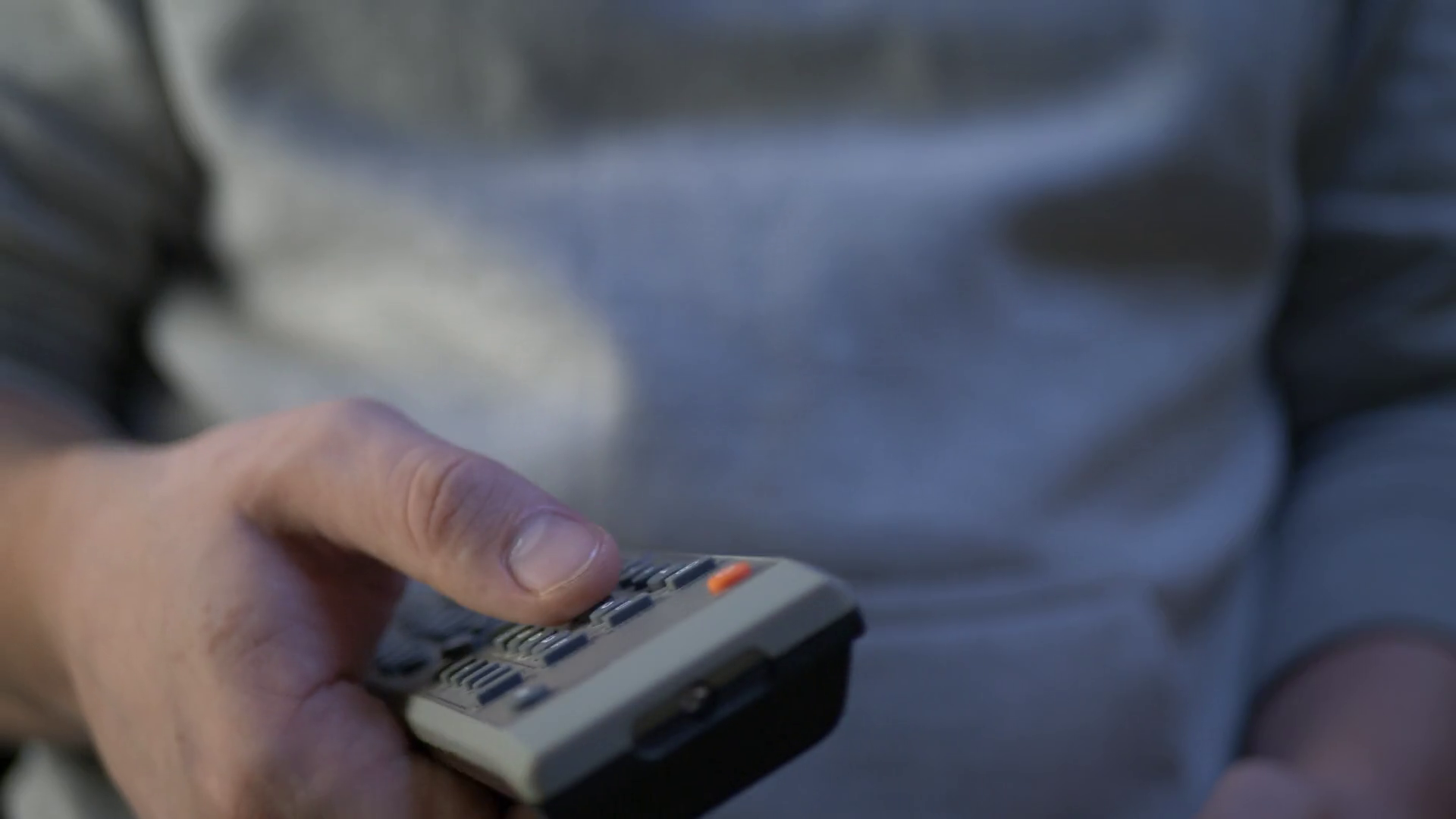 Watching TV and using remote controller. Watching Movie On TV At Home ...