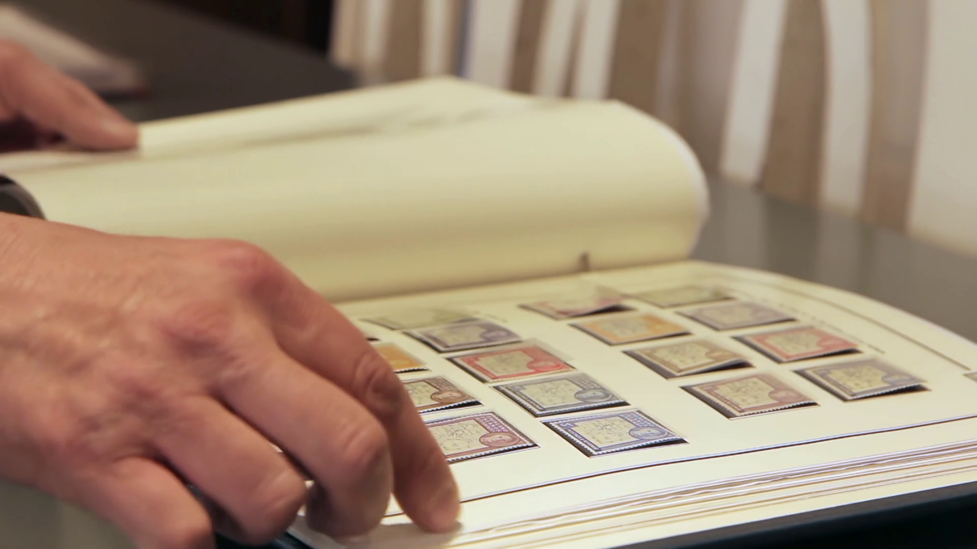 Hands Flipping Through Vintage Stamp Album Stock Footage SBV-352327486 ...