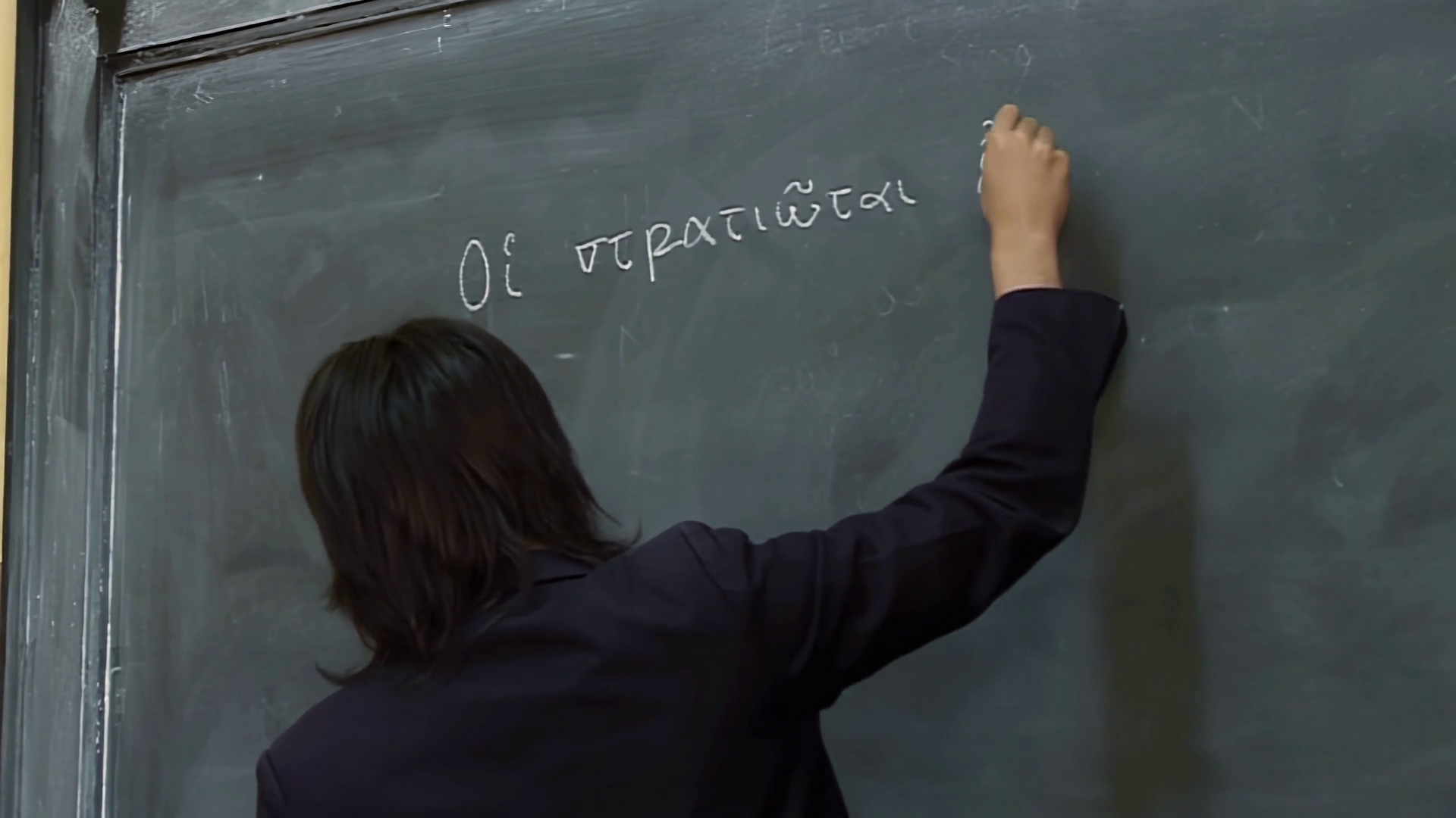 Student Writing Greek On Blackboard At Stock Footage SBV-352487662 ...