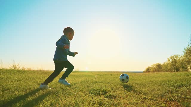 People Kicking A Soccer Ball Stock Footage: Royalty-Free Video Clips ...