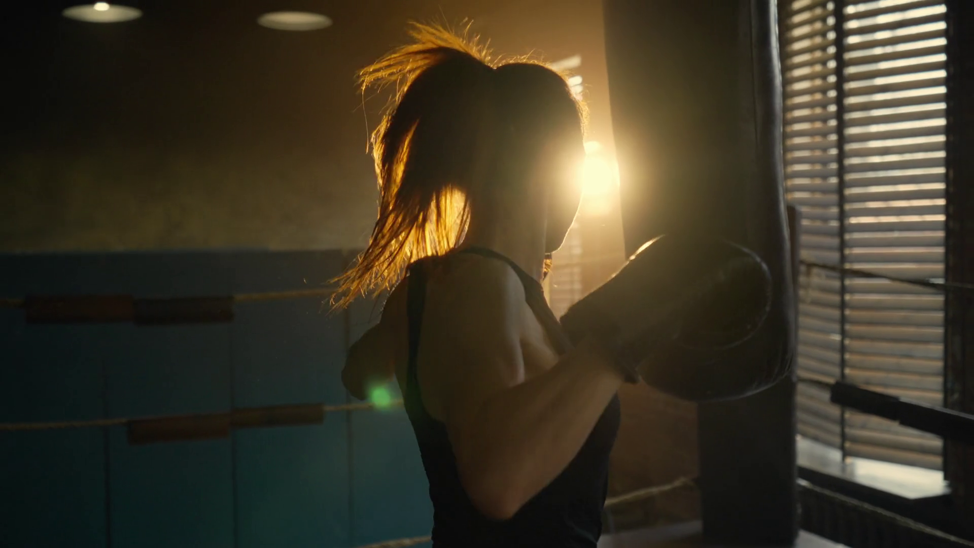 Woman Boxer Practicing Punches Using Bag In Stock Footage SBV-348824061 ...