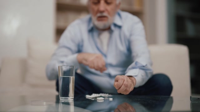 Man Eating Medicine Stock Footage: Royalty-Free Video Clips - Storyblocks