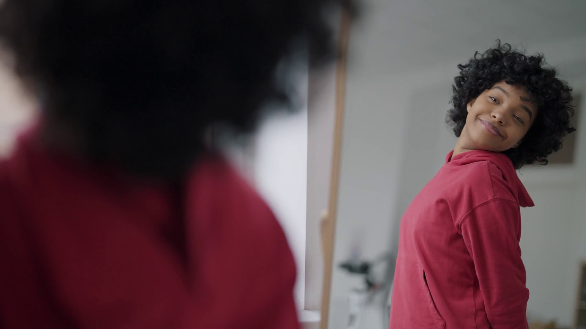 Positive Relaxed Girl Preening Curly Hair Stock Footage SBV-347676729 ...