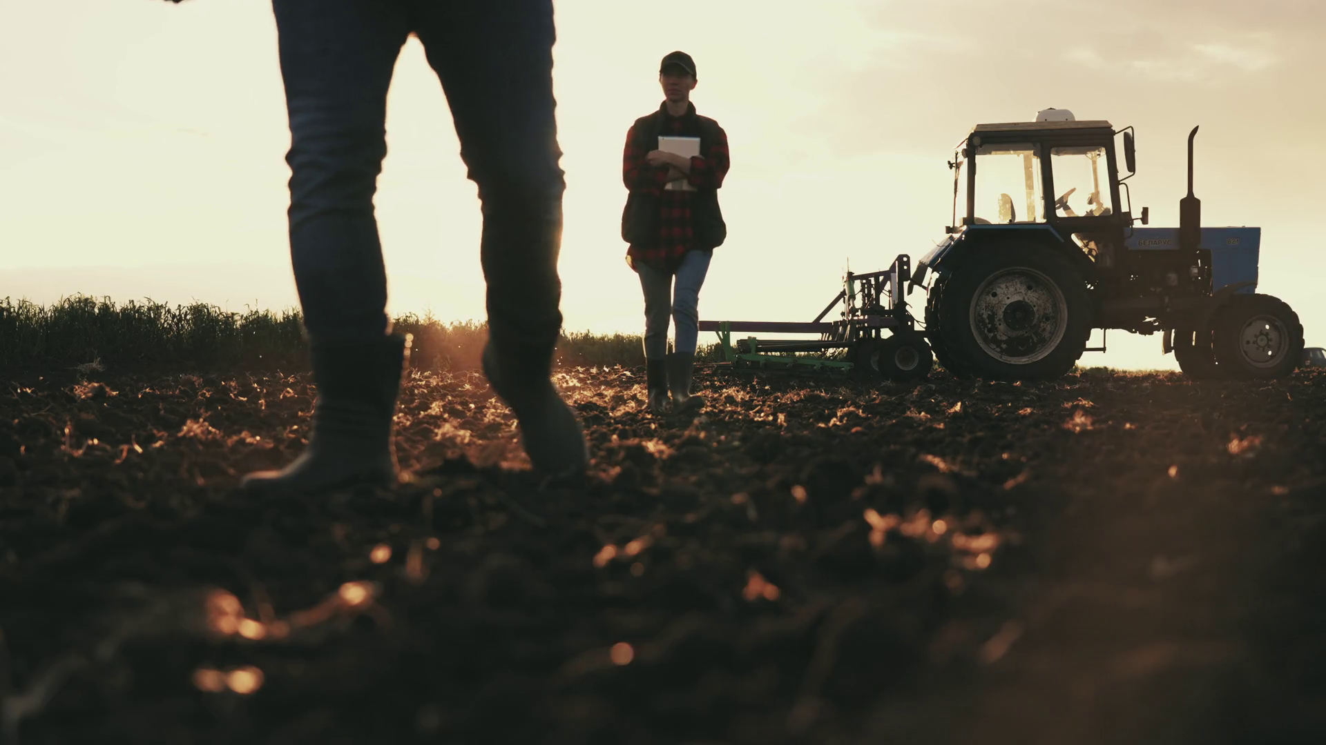 Two People In Rubber Boots Go To Tractor On Stock Footage SBV-347802444 ...