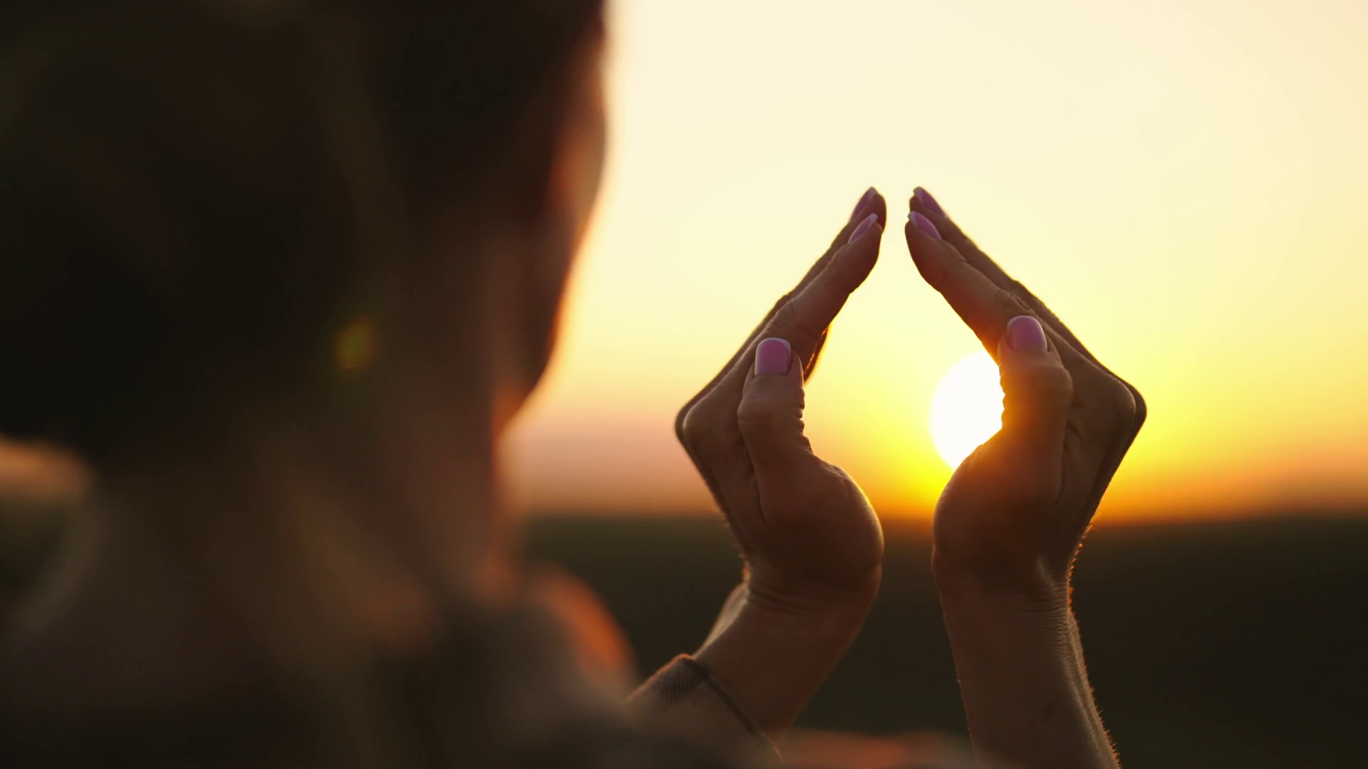 Woman Folding Hands Around Sun At Sunset In Stock Footage SBV-348466191 ...