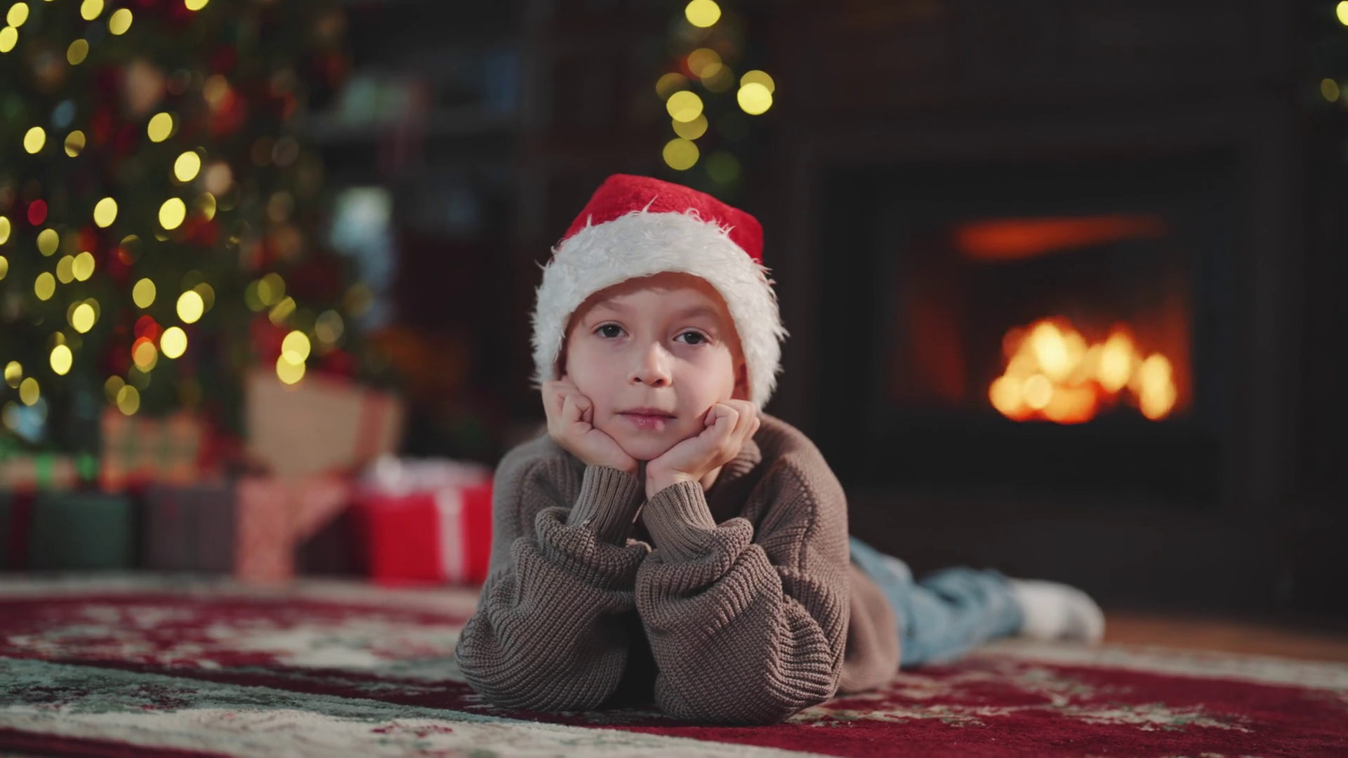Portrait Boy In Santa Hat Lying On Floor Stock Footage SBV-348665296 ...