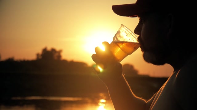 Cowboy Drinking A Beer Stock Footage: Royalty-Free Video Clips ...