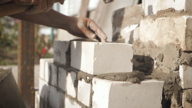 Building House Bricks Stock Footage: Royalty-Free Video Clips - Storyblocks