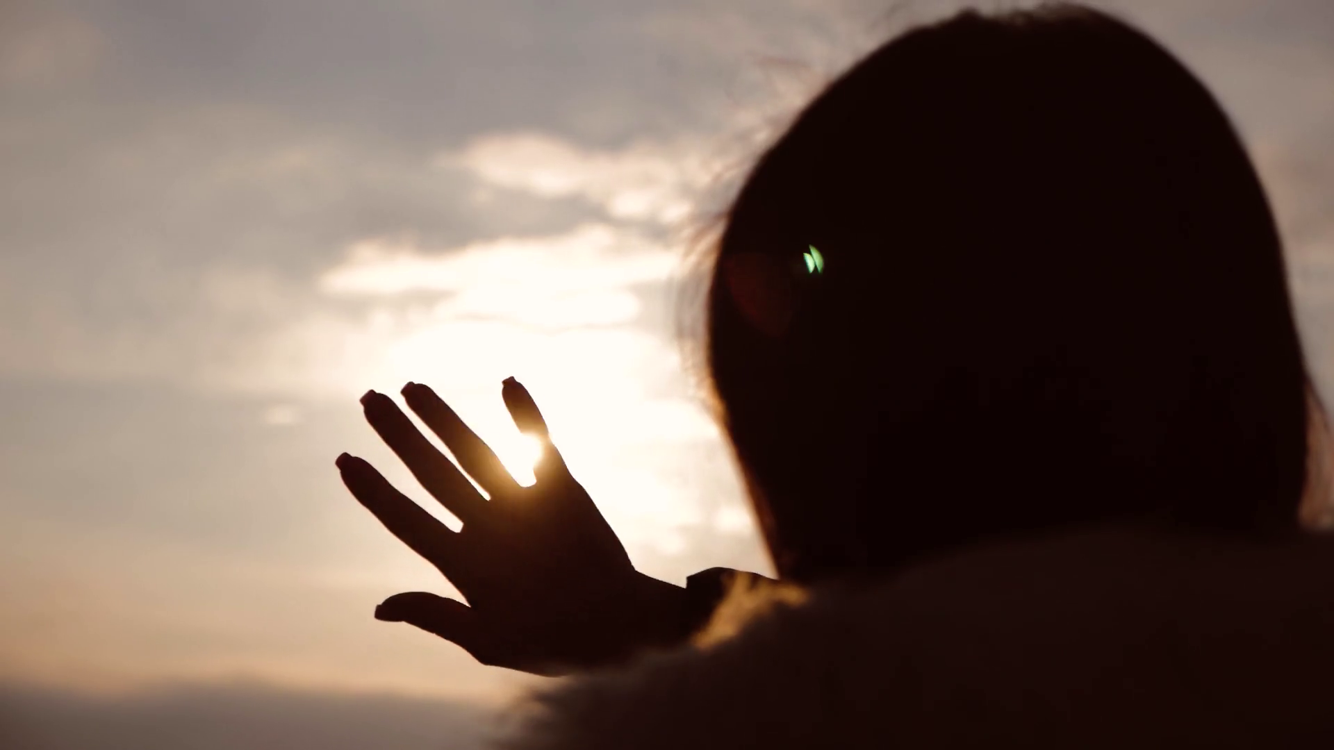 Girl Looks At Sun Through Hand At Sunset Stock Footage SBV-332821229 ...