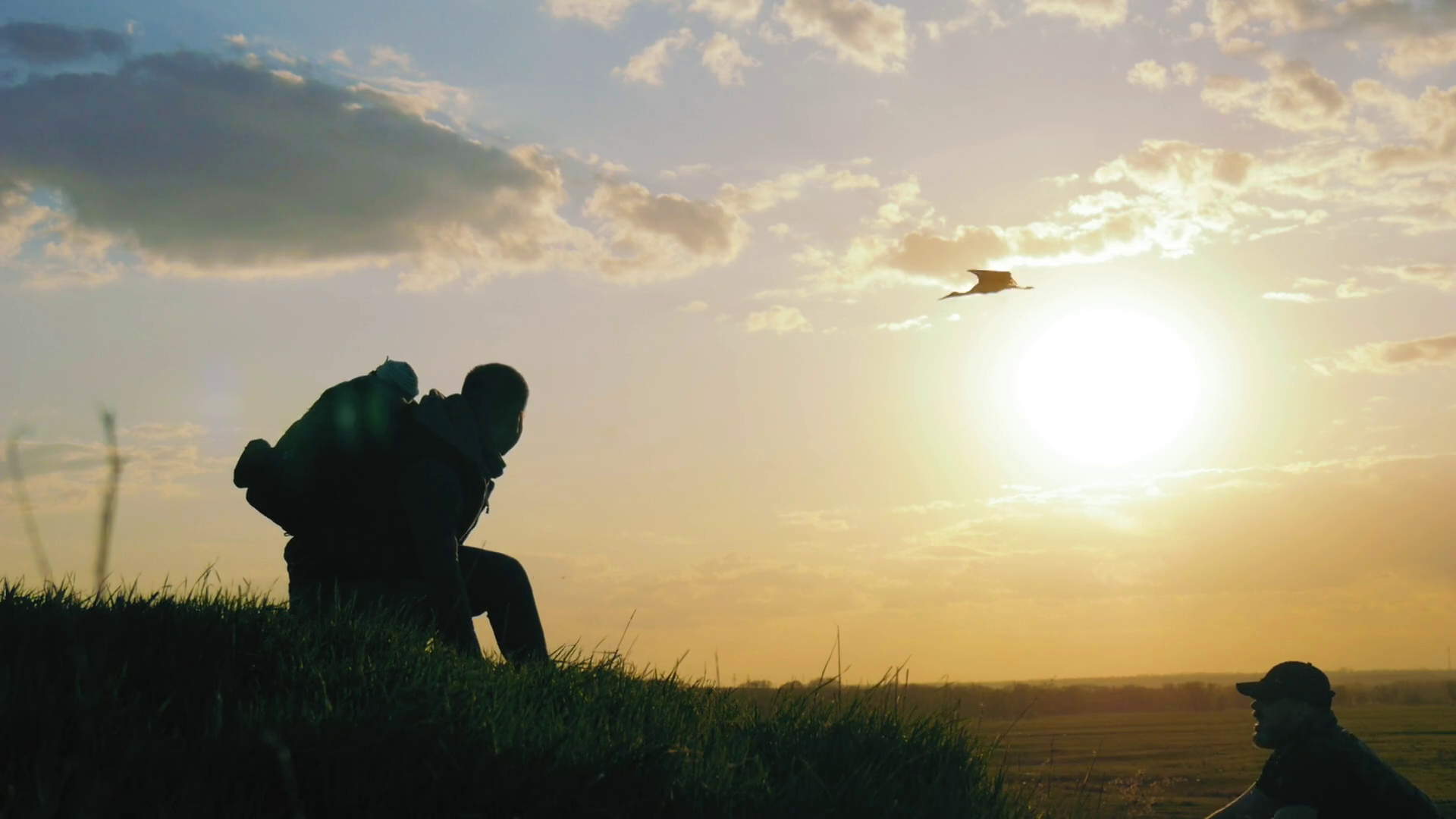 Helping Hand. Man giving hand a male to help her to climb the mountain ...