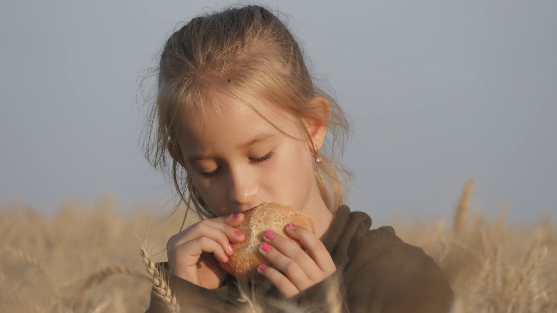 Hungry Child Eating Bread In Wheat Field Stock Footage SBV-337227394 ...
