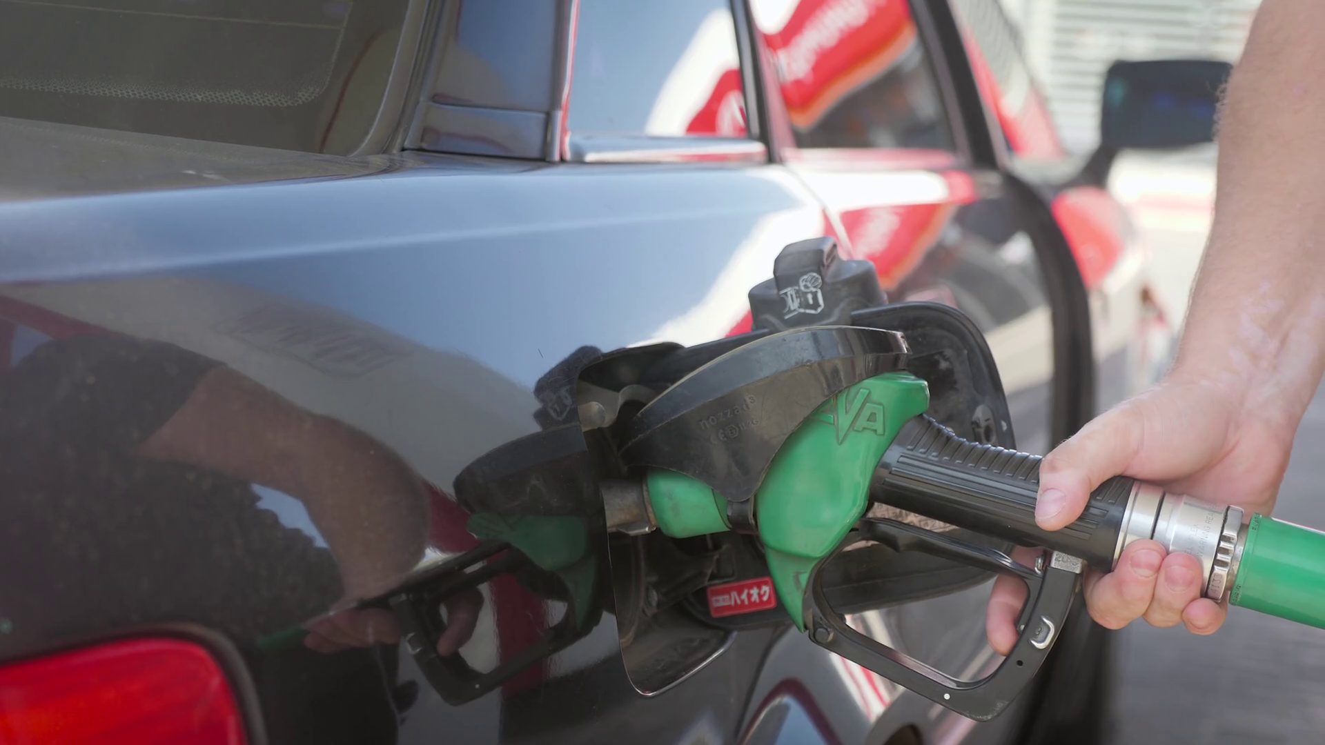 Man of petroleum gasoline station service. Oil refueling and refilling ...
