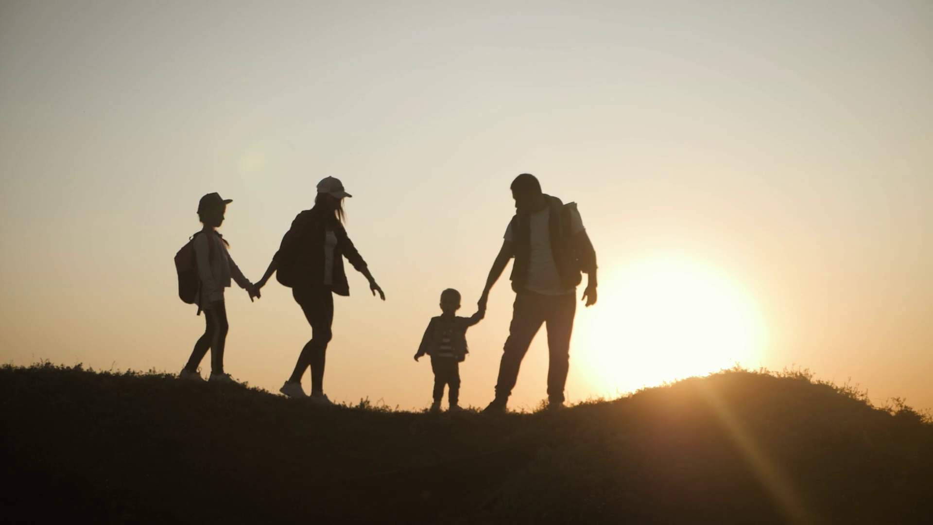 Family Hiking In Mountains At Sunset Stock Footage SBV-337774777 ...