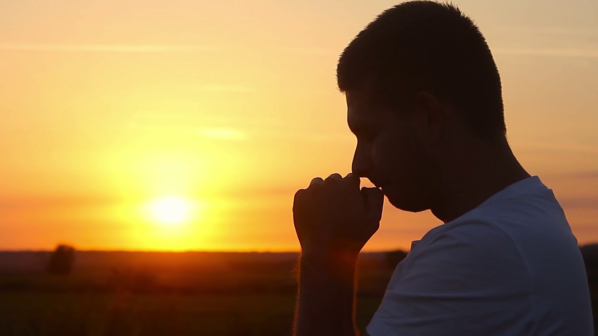 Silhouette Of Man Praying At Sunset Concept Stock Footage SBV-317603553 ...