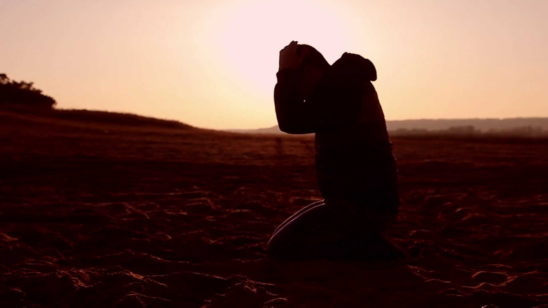 Silhouette Of Man Praying At Sunset Concept Stock Footage SBV-313516587 ...