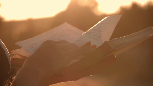 Closing Book Stock Footage: Royalty-Free Video Clips - Storyblocks