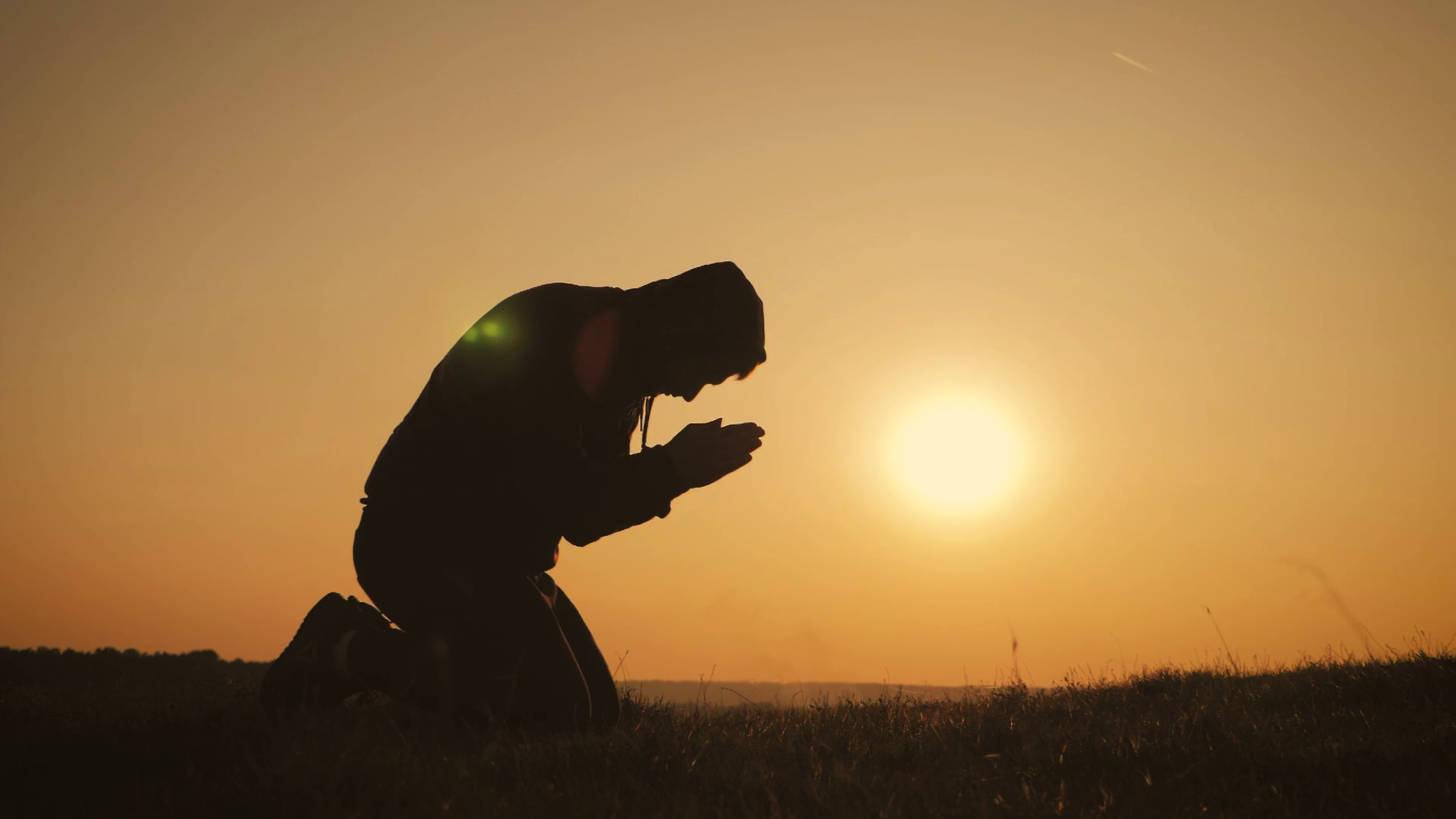 Young Man Praying At Sunset Seeking Solace Stock Footage SBV-334701178 ...
