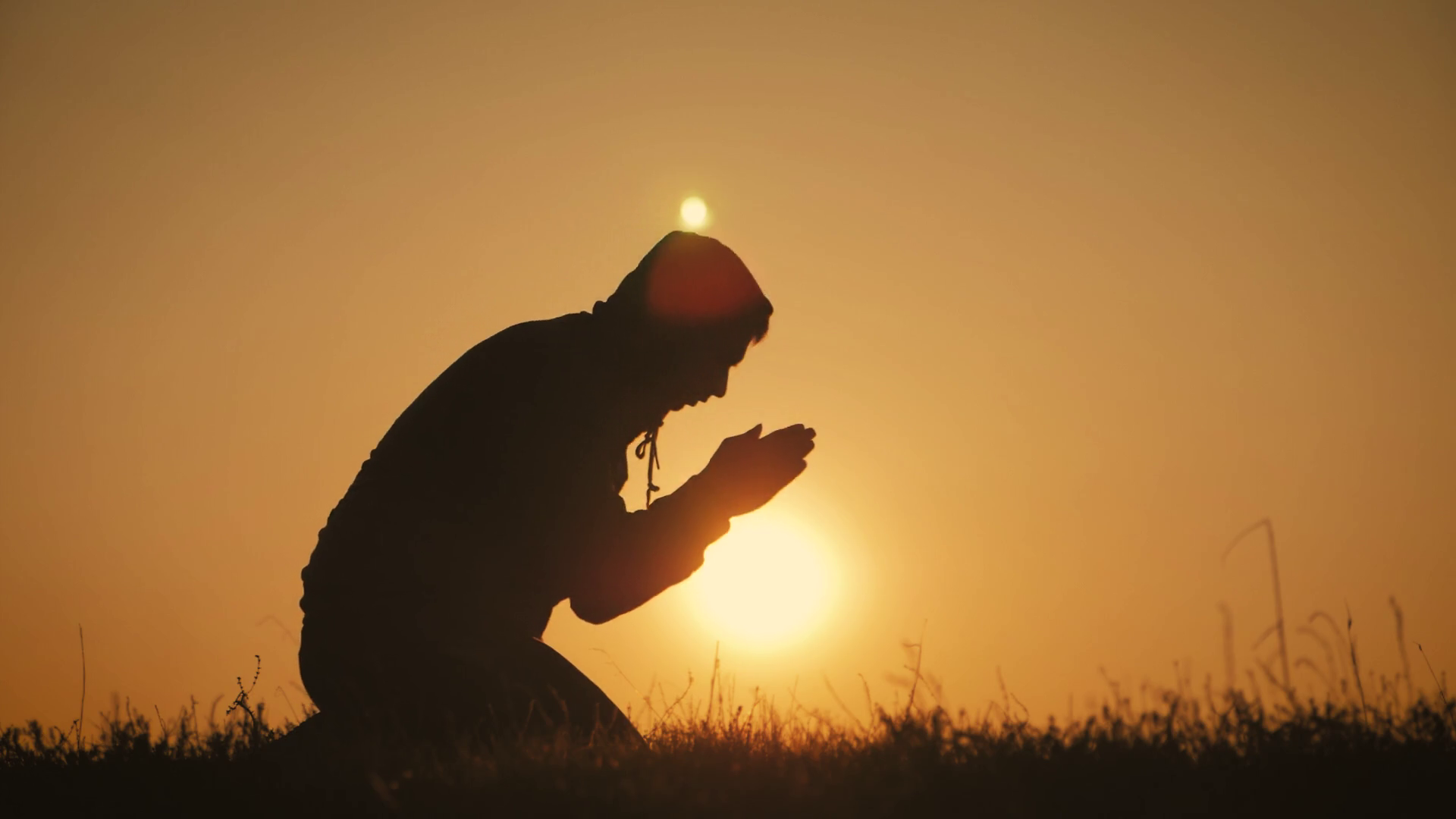 Young Man Praying At Sunset Seeking Solace Stock Footage SBV-334444958 ...