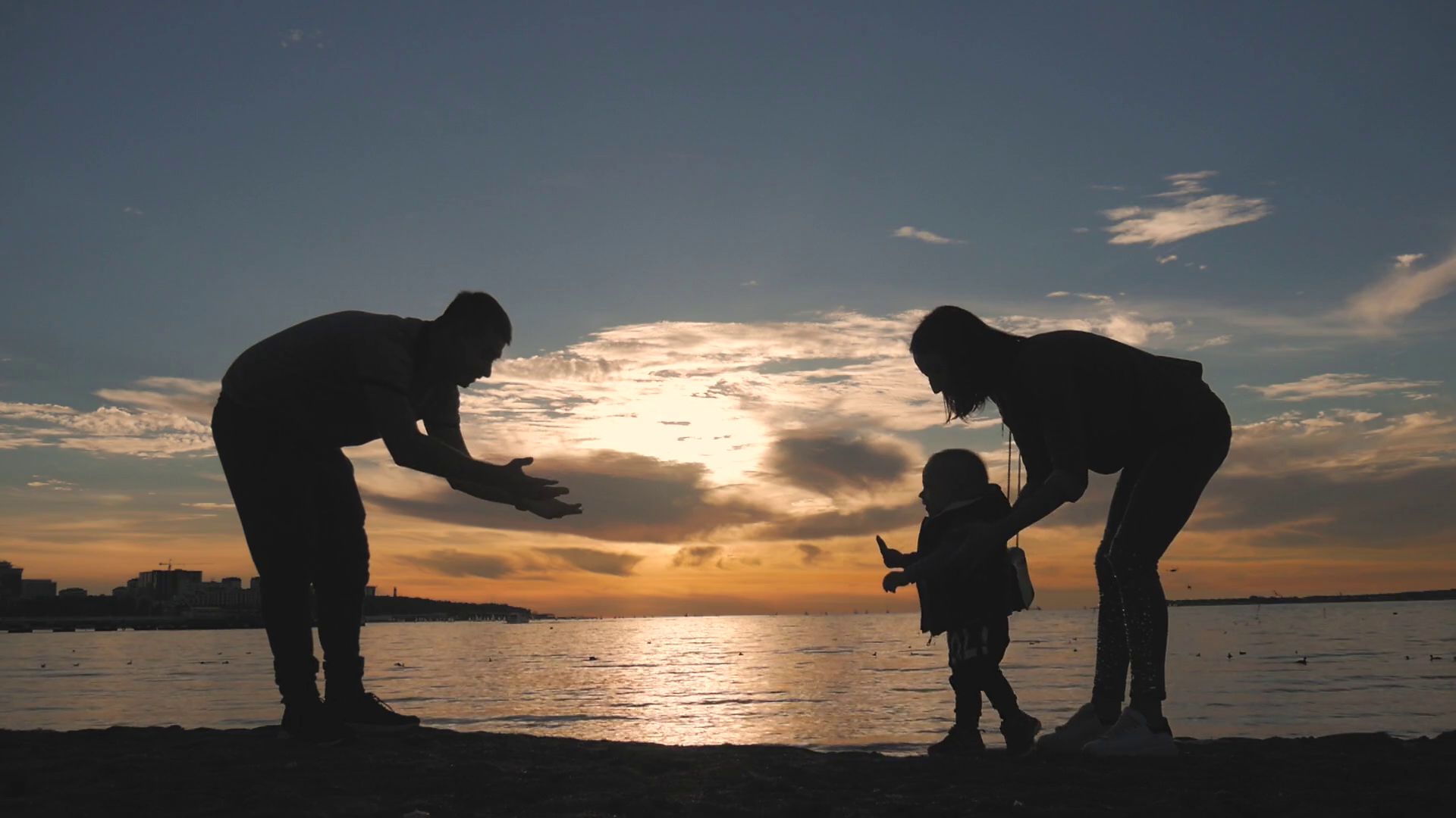 Silhouettes Of Mother Father Teaching Baby Stock Footage SBV-330545310 ...