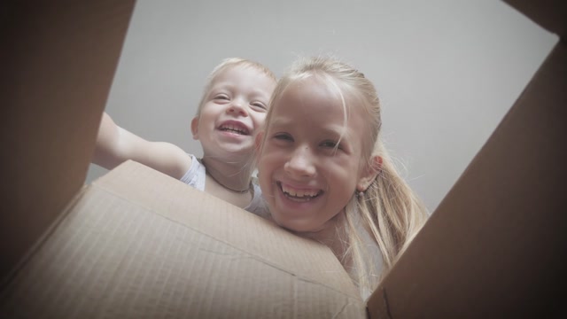 Child Looking Into A Box Stock Footage: Royalty-Free Video Clips ...