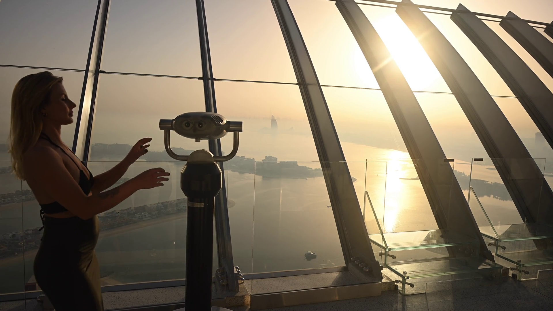 A Woman Stands On Top Of Tall Building At Stock Footage SBV-351981033 ...