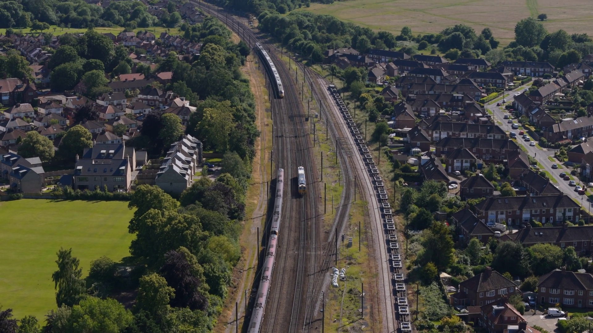 Aerial View Of Trains Going Past Through Stock Footage SBV-351849270 ...