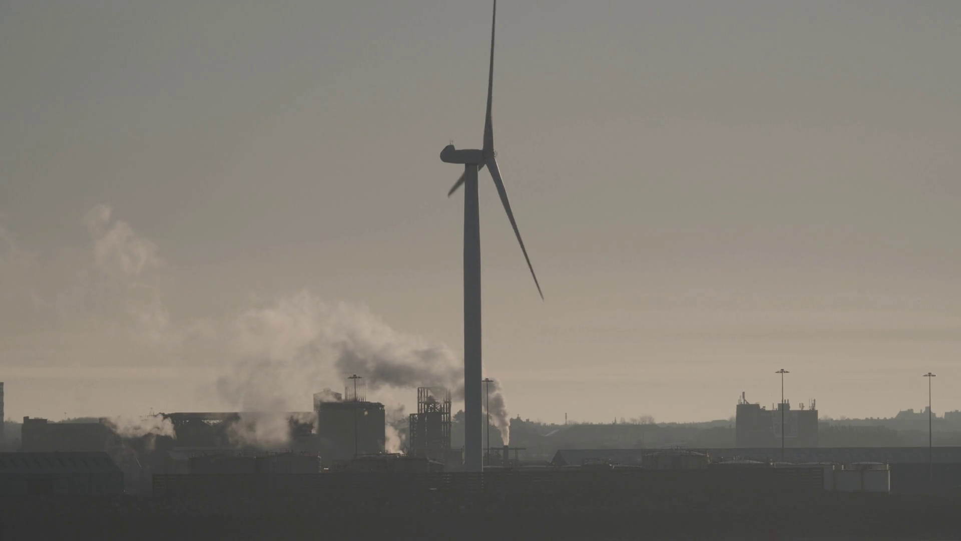 Wind Turbine With Steam Coming From Chimney Stock Footage SBV-351882917 ...