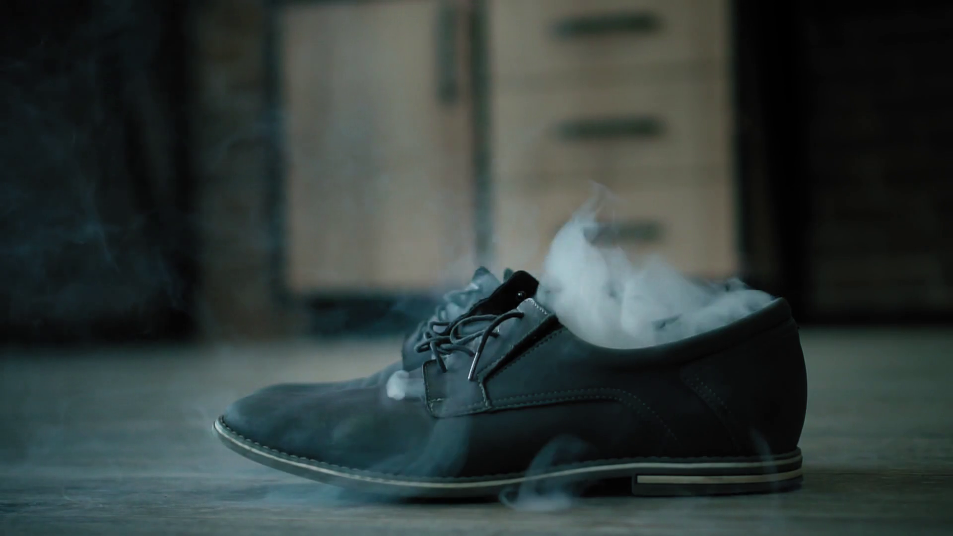 Men's Shoes Are On Floor Smoke Comes Out Of Stock Footage SBV-331204741 ...