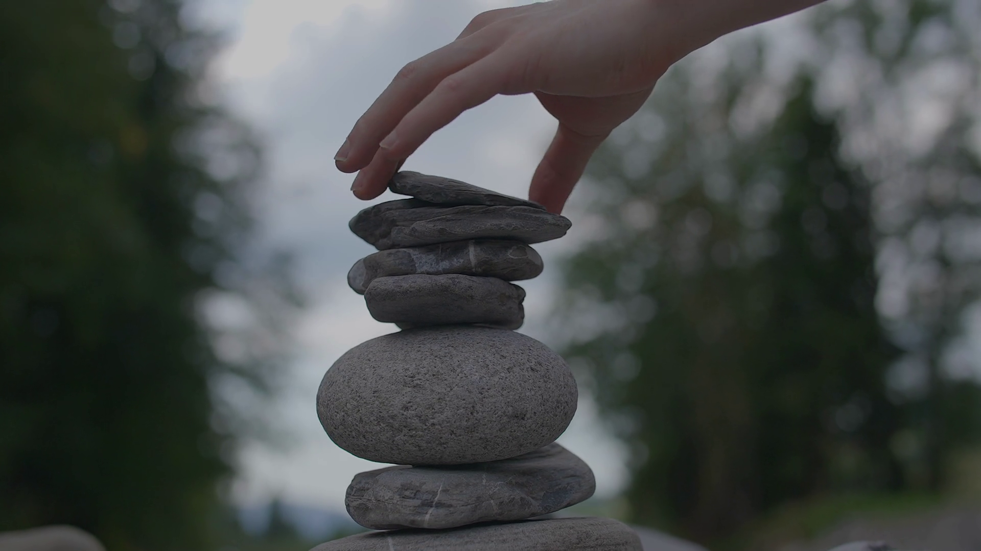 A Man Woman Building Stone Tower Together Stock Footage SBV-348669912 ...