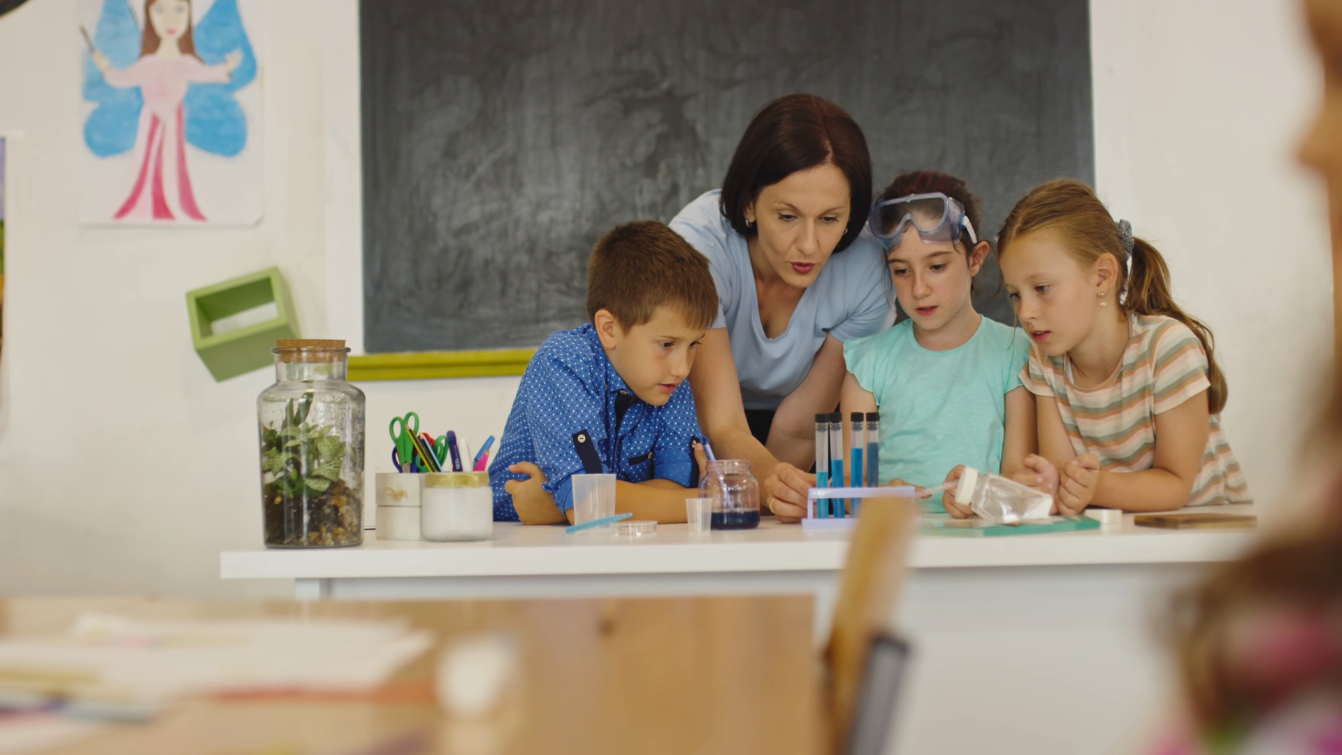 Female Teacher Guiding Focused Elementary Stock Footage SBV-353503955 ...