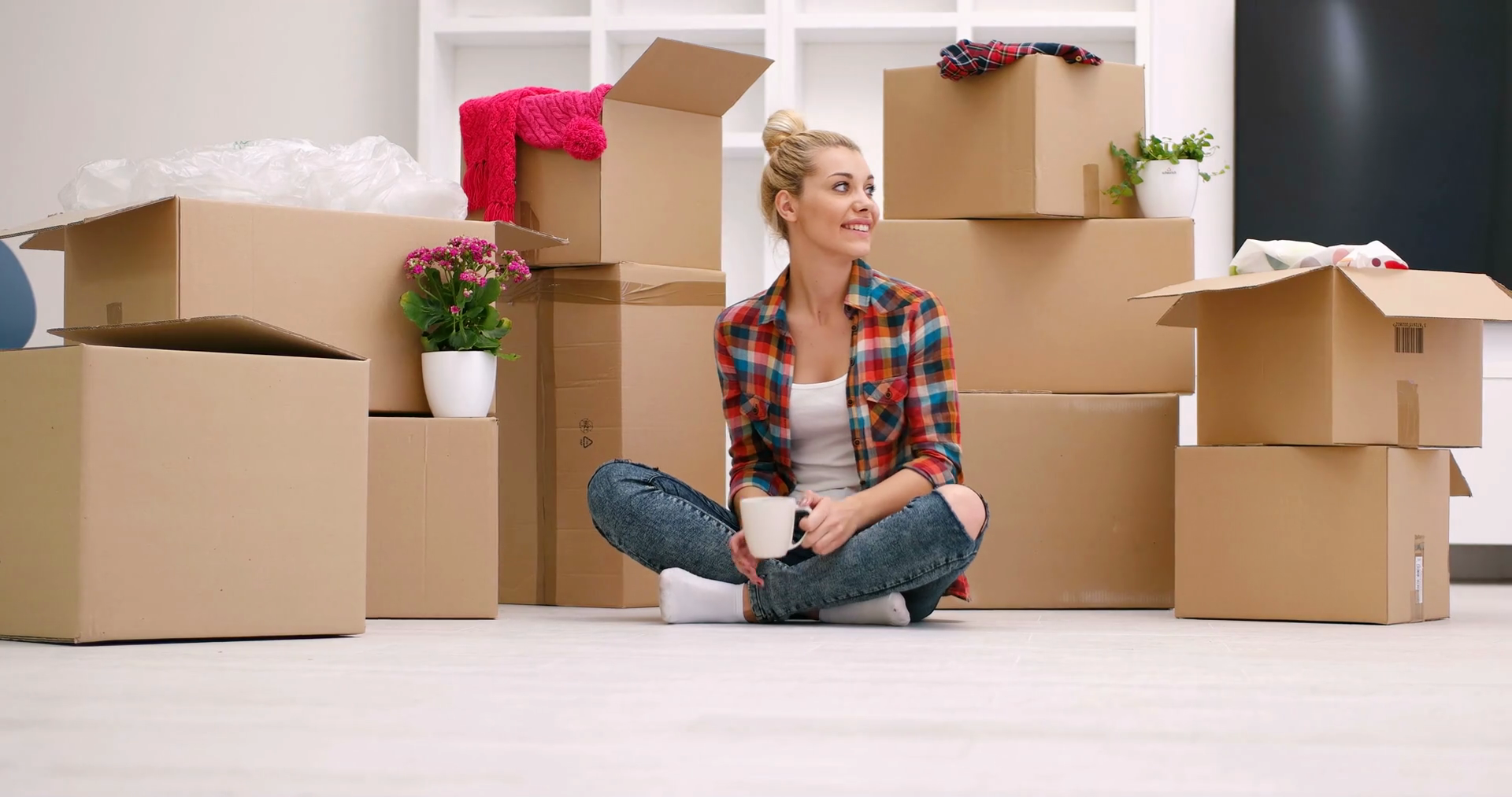 Young Woman Moving Into New Home Decorating Stock Footage SBV-318398141 ...
