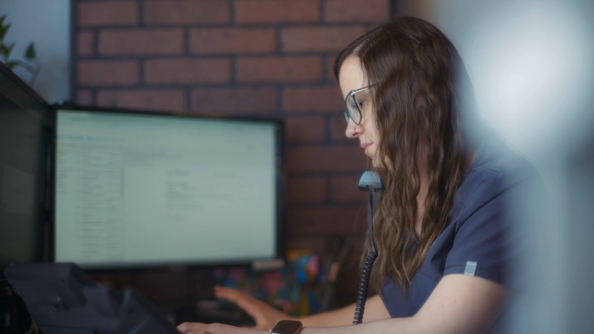 A Vet Receptionist Typing On Computer Stock Footage SBV-347770977 ...