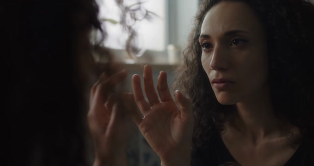 Woman Looks In The Mirror Stock Footage: Royalty-Free Video Clips ...