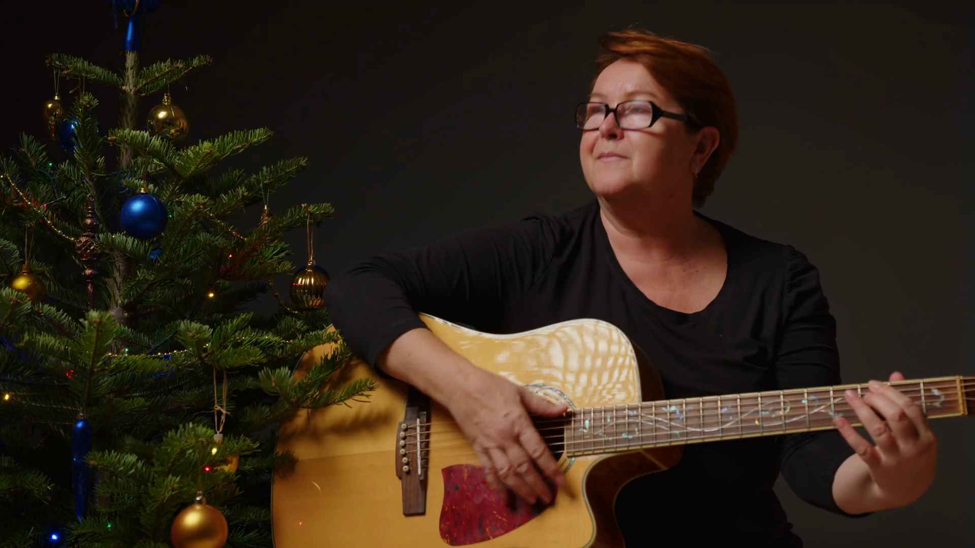 Woman Playing Christmas Songs On Guitar Stock Footage SBV-348575129 ...