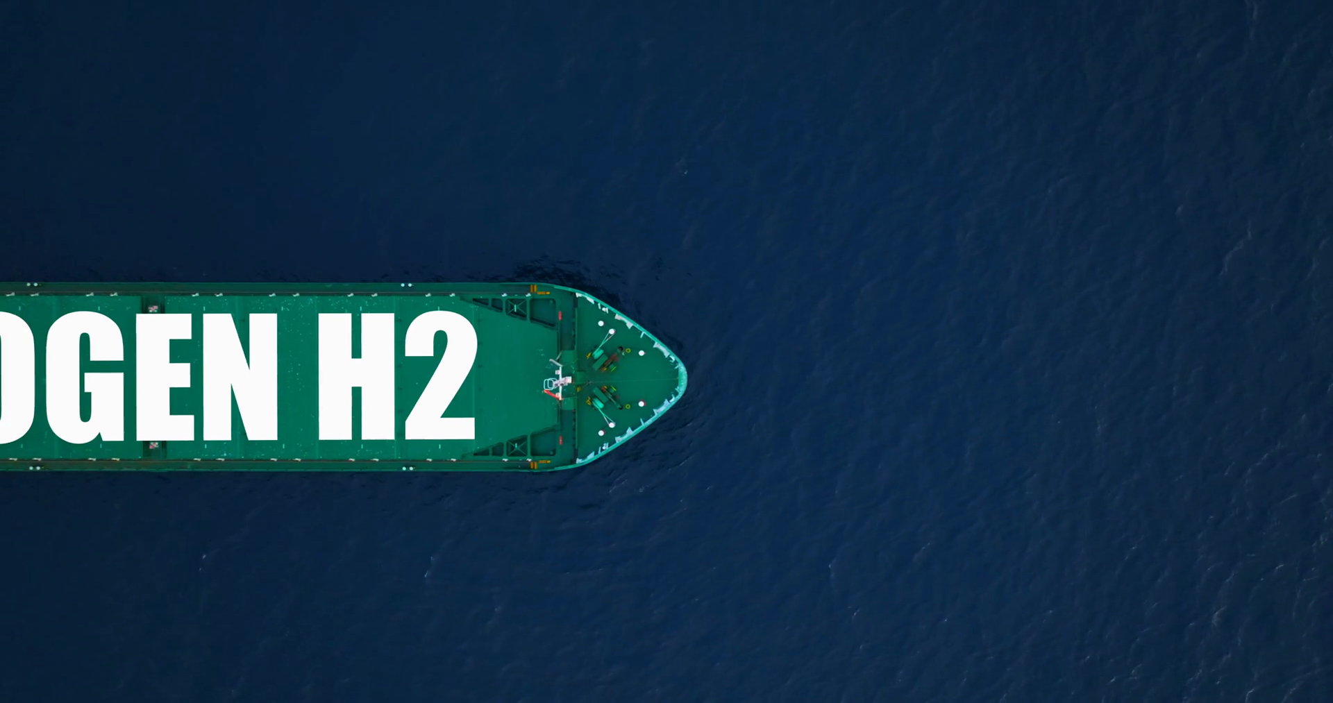 A Large Green Ship In Blue Ocean Is Carrying Stock Footage SBV ...
