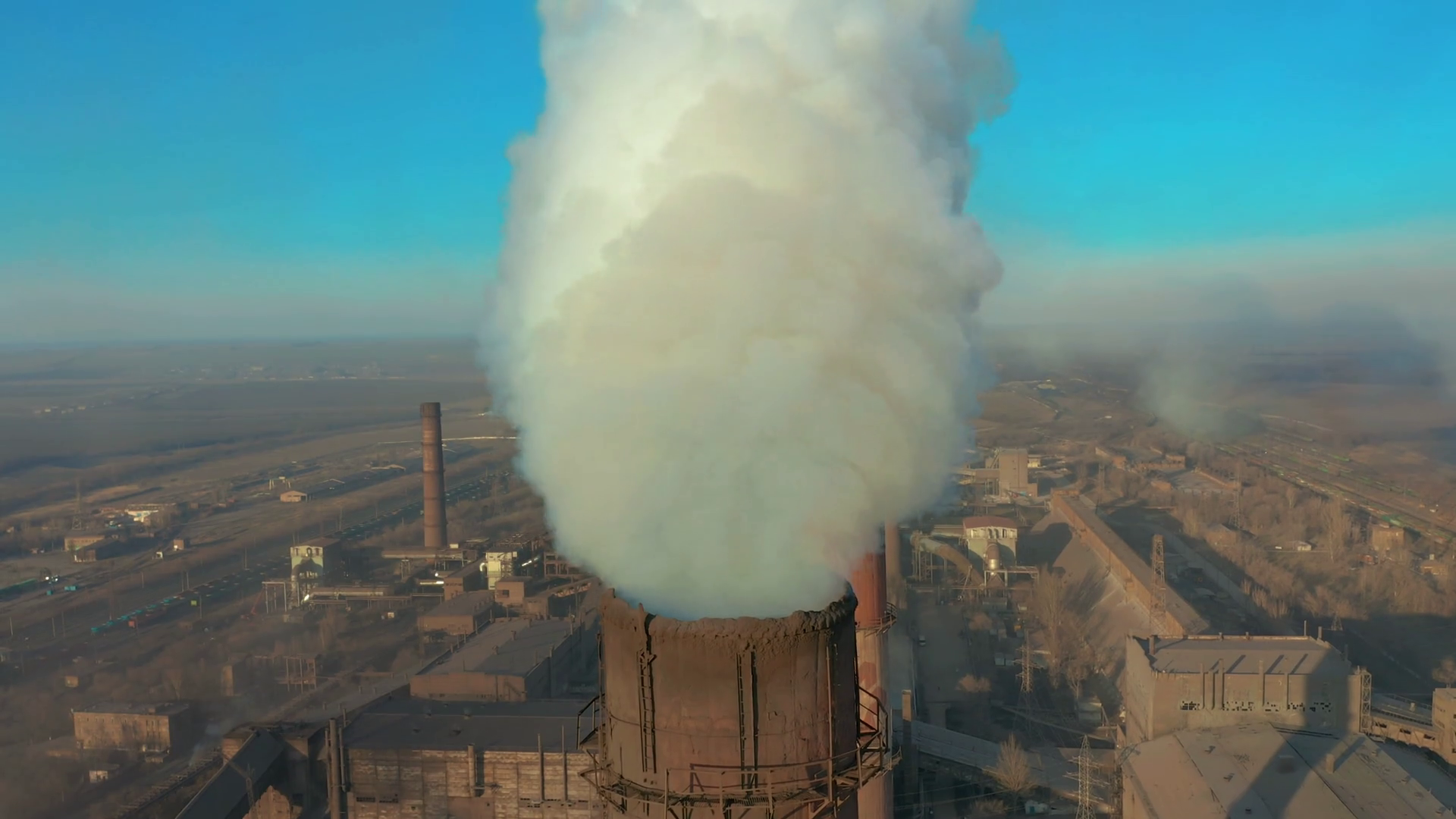 Billowing Steam From Smoke Stack Filling Sky Stock Footage SBV ...