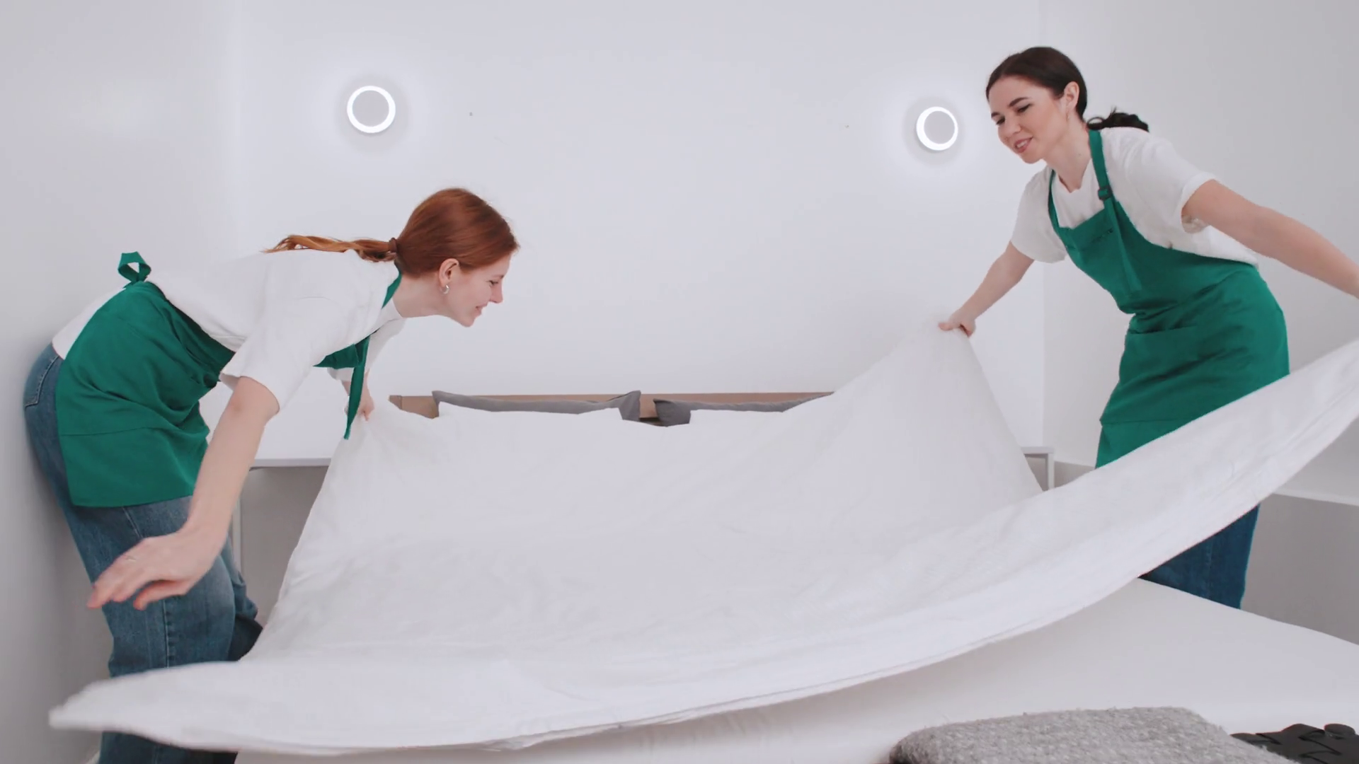 Two Women Making Bed In Modern Hotel Room Stock Footage SBV-351960444 ...