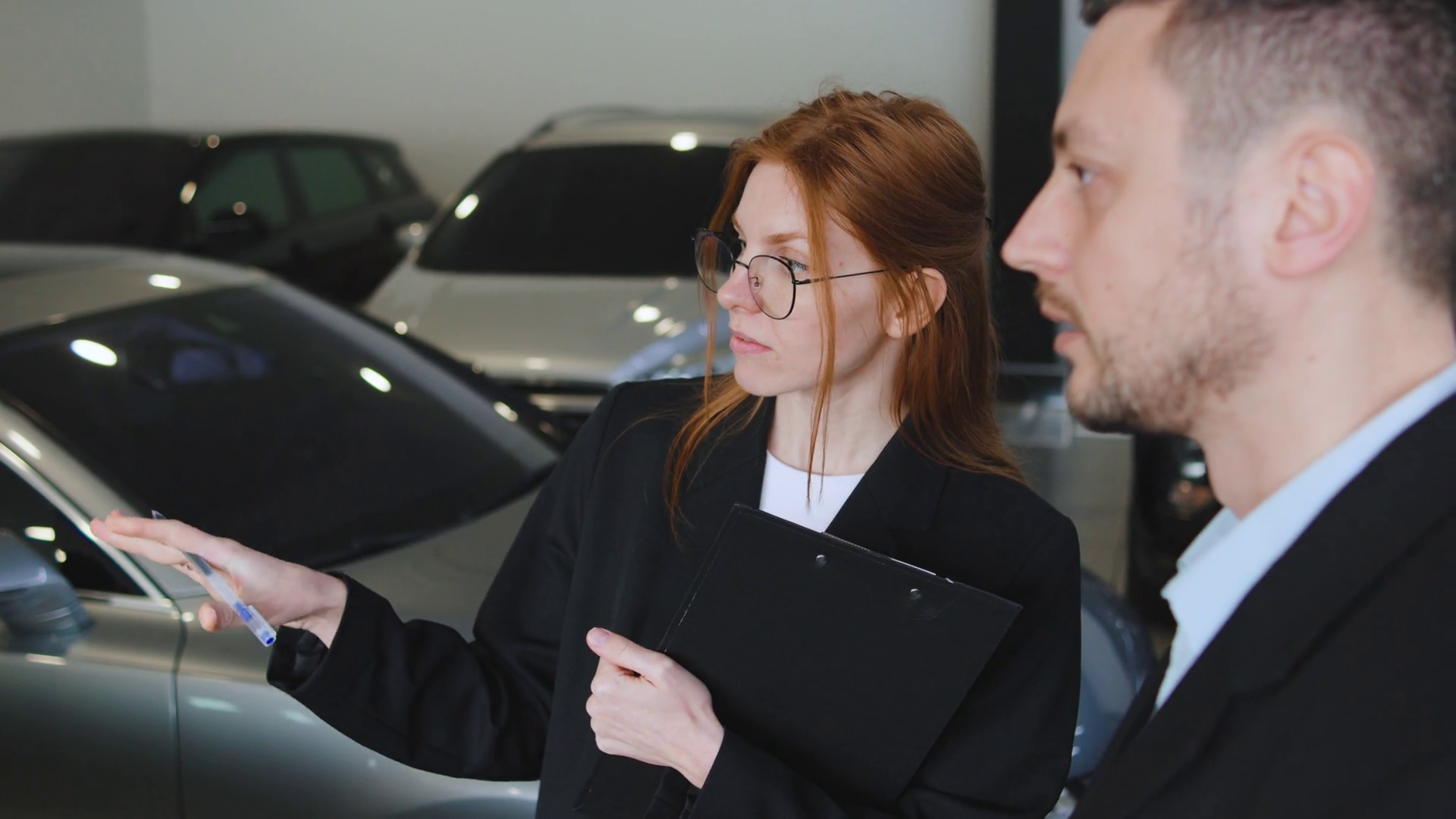 Professionals Discussing Vehicle Features In Stock Footage SBV ...