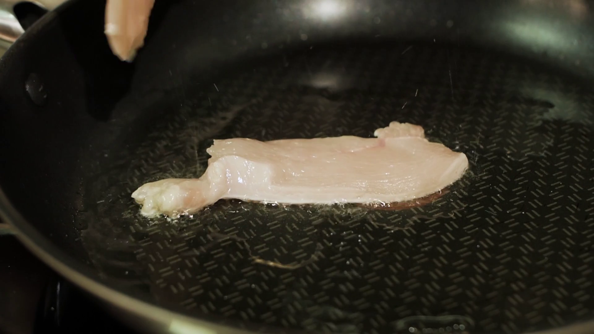 chef cooking hot wok with chicken and vegetables Stock Video Footage 00 ...