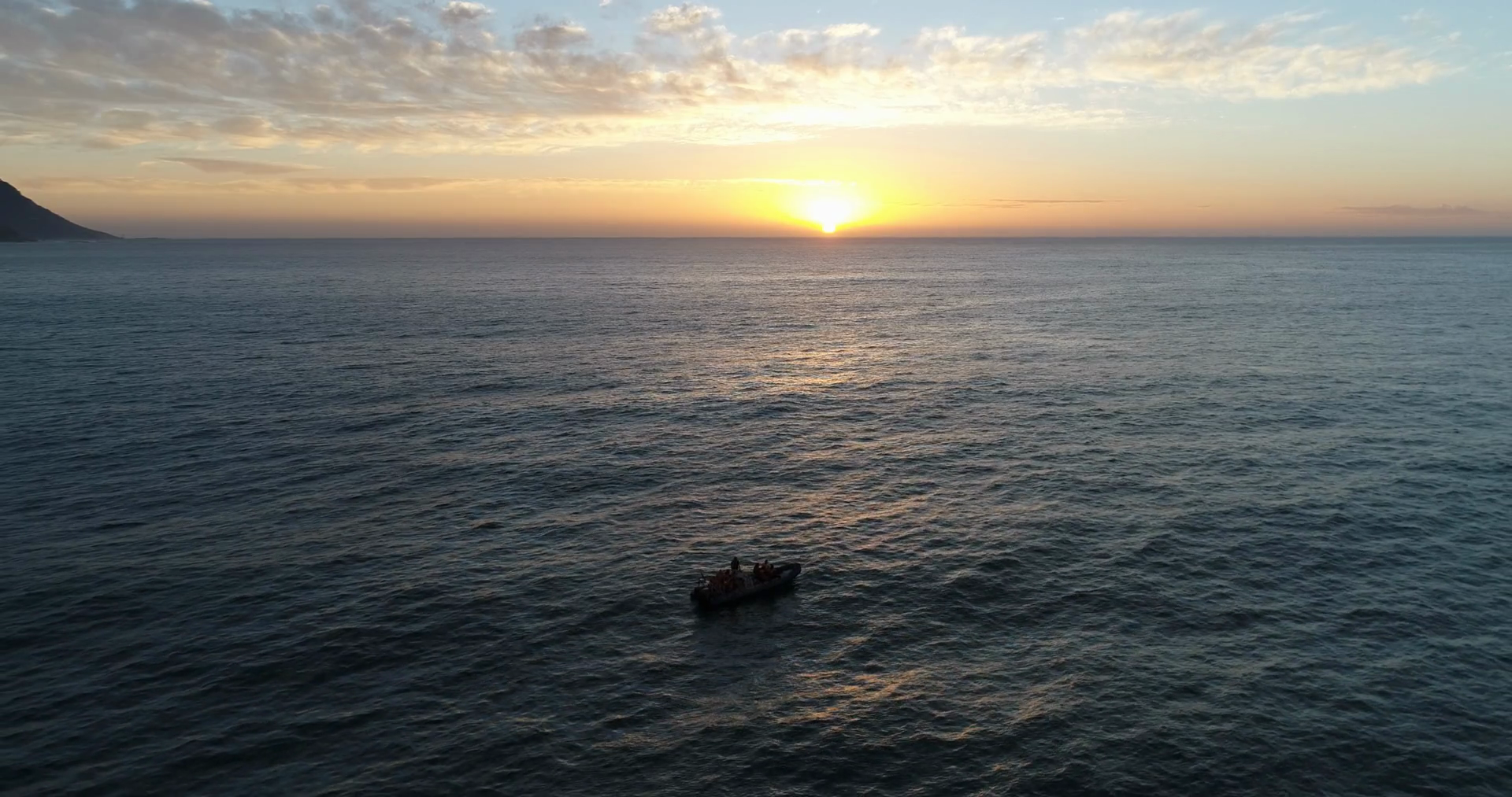 Aerial Of Boat Floating In Ocean At Sunset Stock Footage SBV-316947739 ...