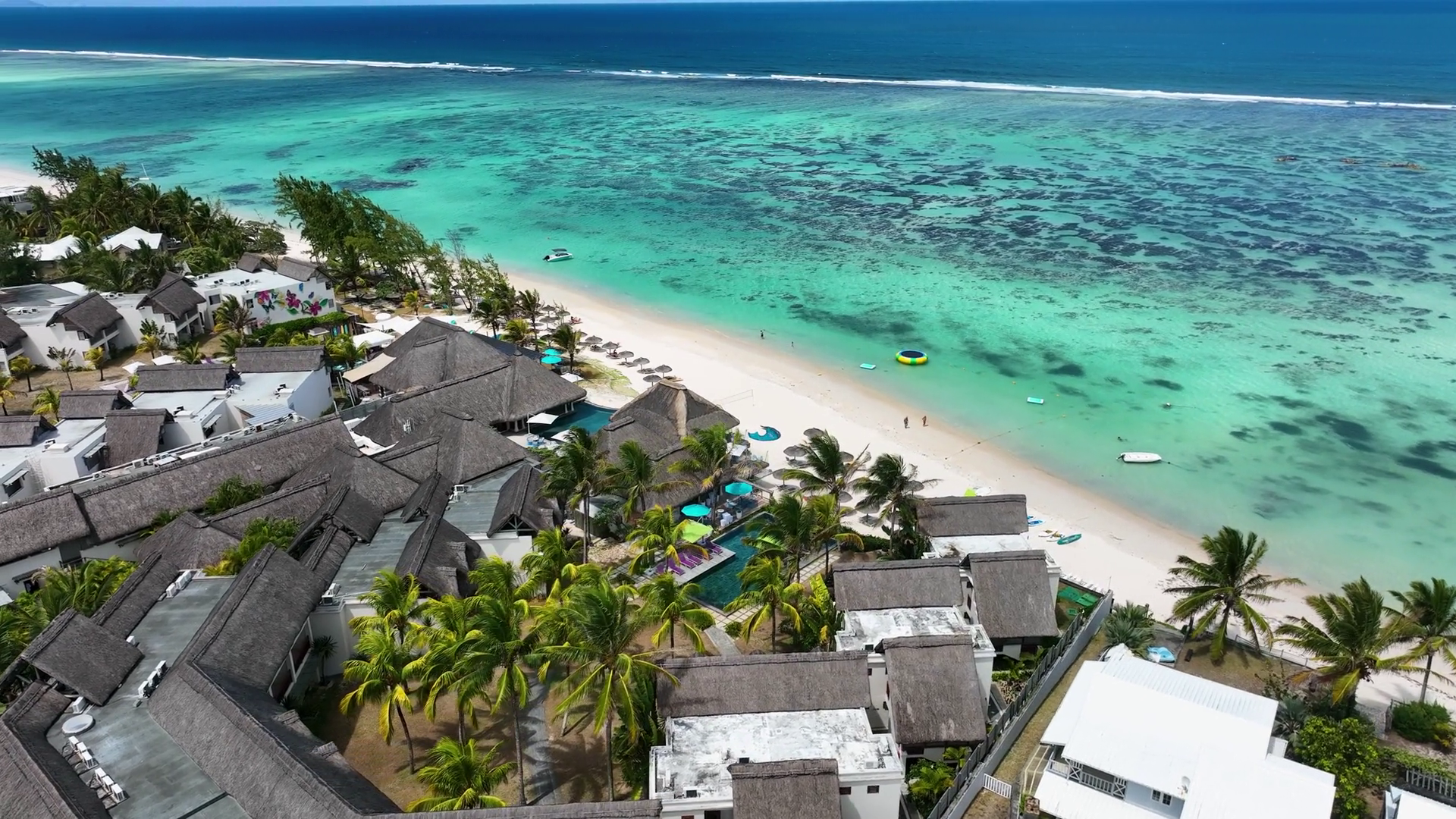 Aerial Video Of Beachfront Resort With Reef Stock Footage SBV-352110328 ...