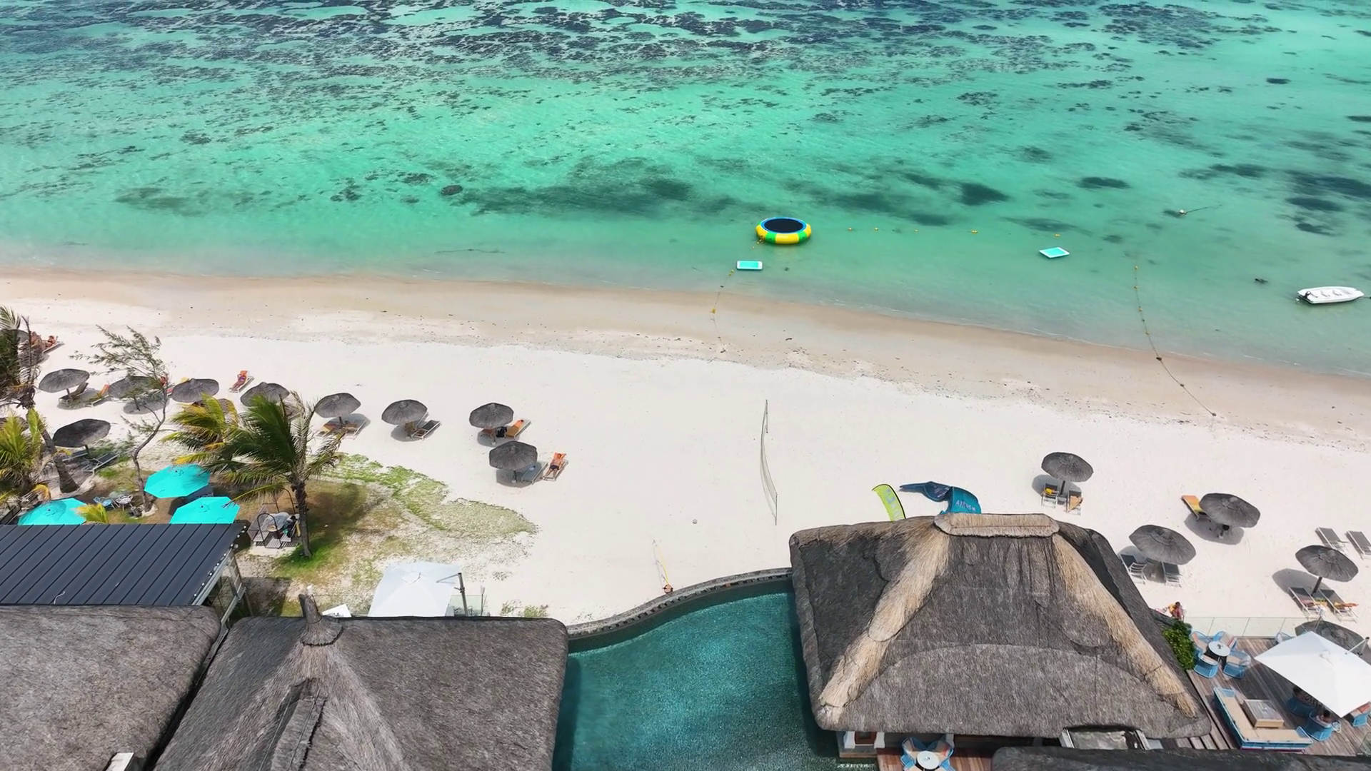 Aerial Video Of Beachfront Resort With Reef Stock Footage SBV-352110330 ...