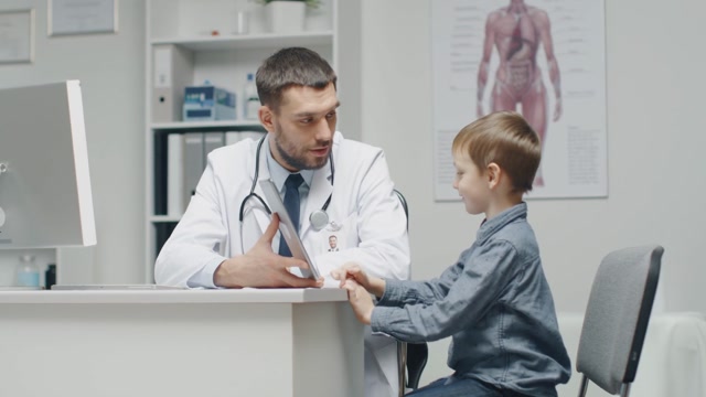 Doctor Examines Shirtless Boy Stock Footage: Royalty-Free Video Clips ...