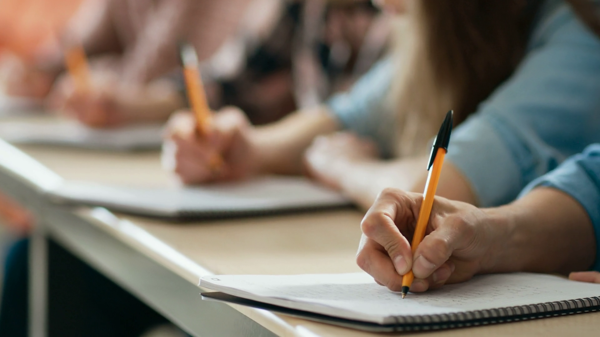 Close-up Of Row Of Students Writing In Stock Footage SBV-353348063 ...