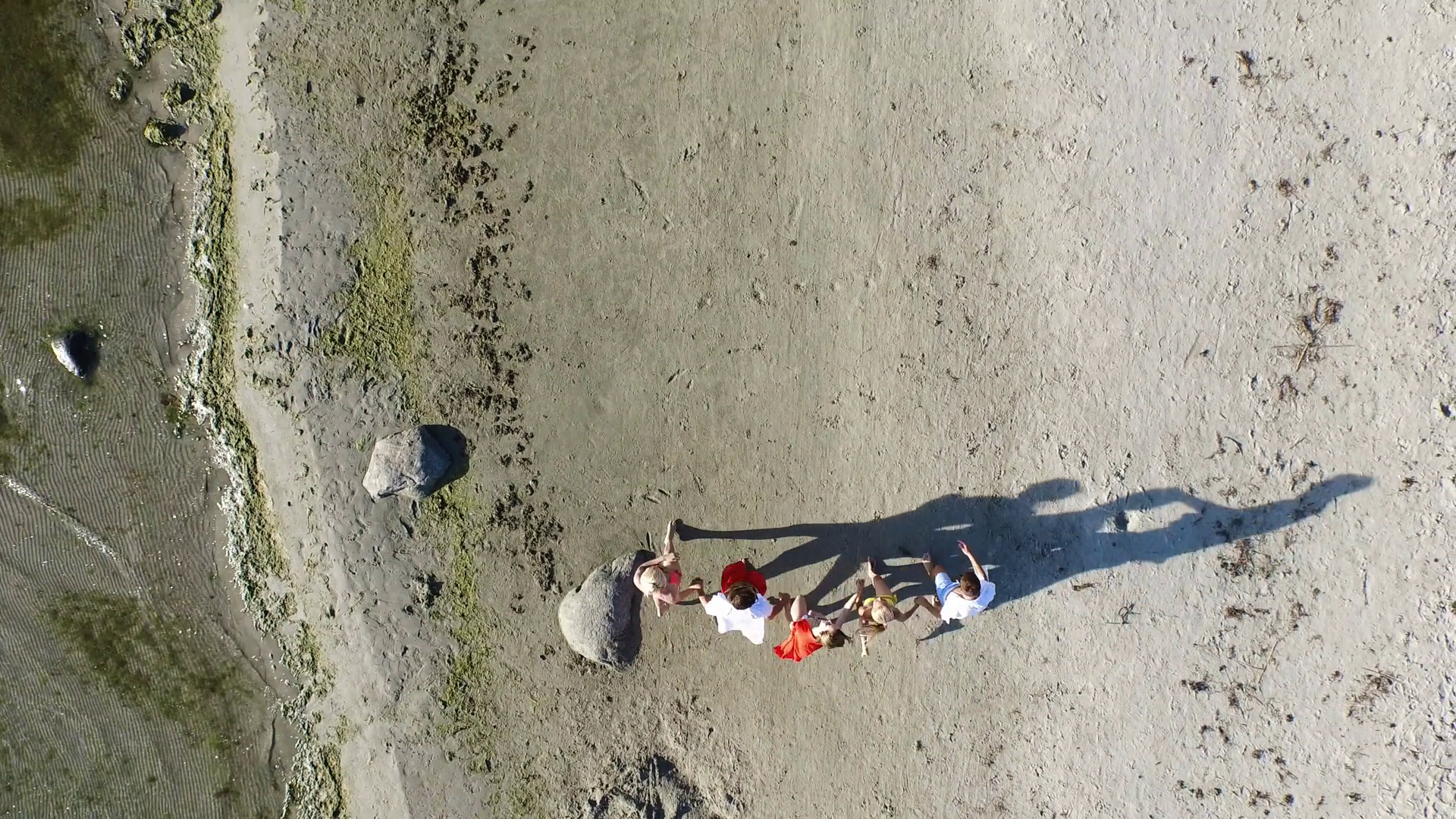 Aerial Drone Shot Of People Running On Beach Stock Footage SBV ...